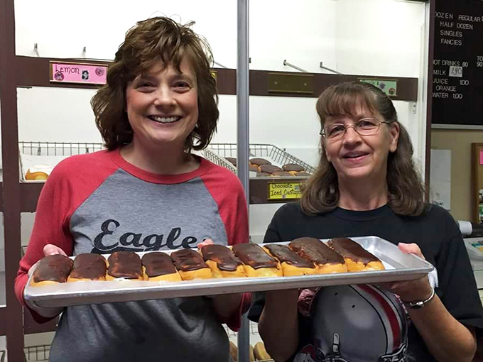 The proud faces behind the donuts showcase the true secret ingredient&mdash;people who care enough to get up at ungodly hours to make your morning special.