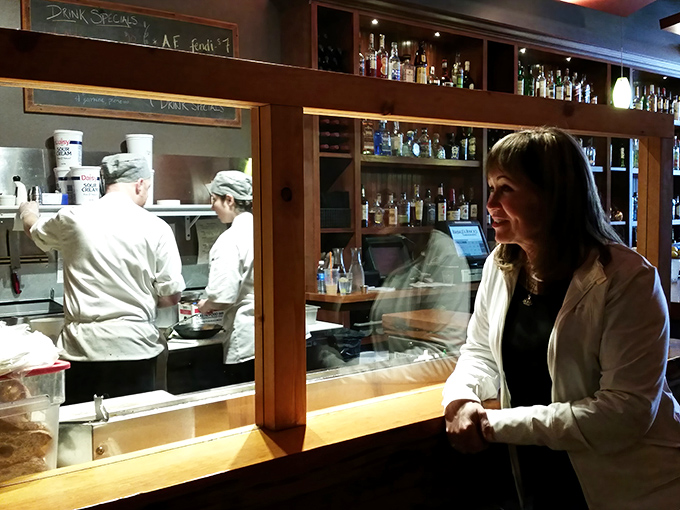 Where culinary magic happens behind glass. Like watching a delicious reality show, except you get to eat the finale. 