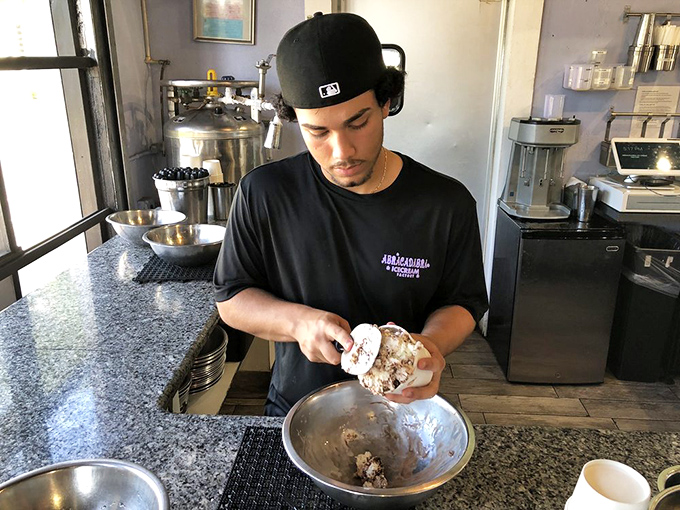 Expert hands work the nitrogen magic, turning science into the smoothest ice cream you'll ever taste.