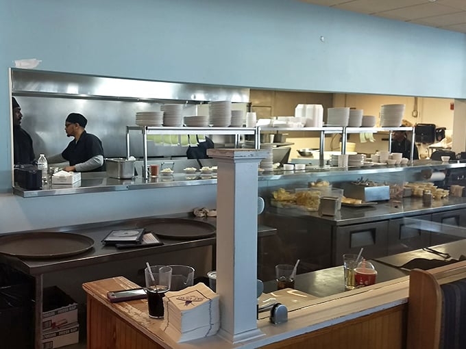 Behind the scenes, culinary magic happens with practiced precision &ndash; turning fresh catches into plates of pure joy.