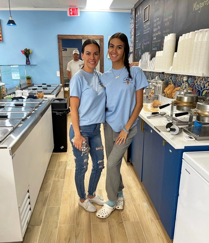 The passionate team behind the scoops, wearing their mission like a badge of honor: bringing joy one cone at a time.