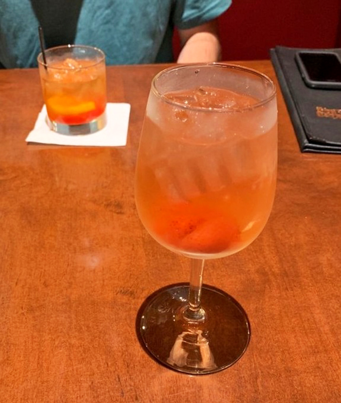 Craft cocktails like strawberry sangria and elderflower old fashioned elevate the dining experience beyond expectations.