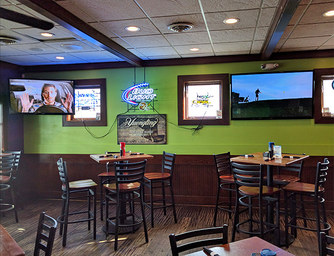 The sports bar area offers a more casual vibe with multiple screens. Because sometimes you need to catch the game while catching dinner.