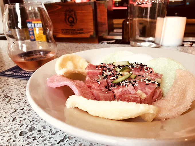 Tuna tartare that's dressed better than most people at dinner&mdash;sesame seeds and cucumber adding texture to this jewel-toned delicacy.