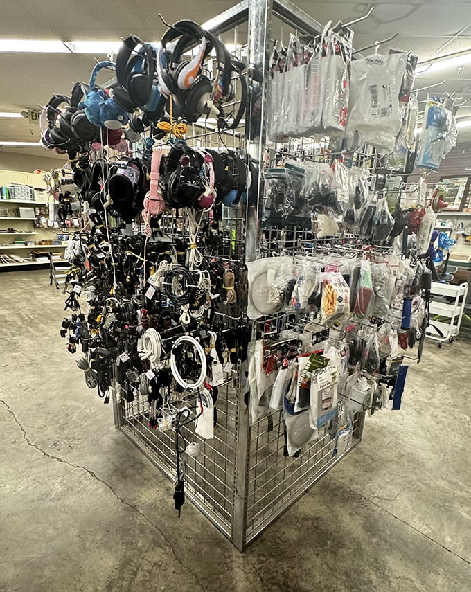 The accessories wall &ndash; a hanging garden of headphones, chargers, and gadget companions. Technology's version of an island of misfit toys seeking new homes.