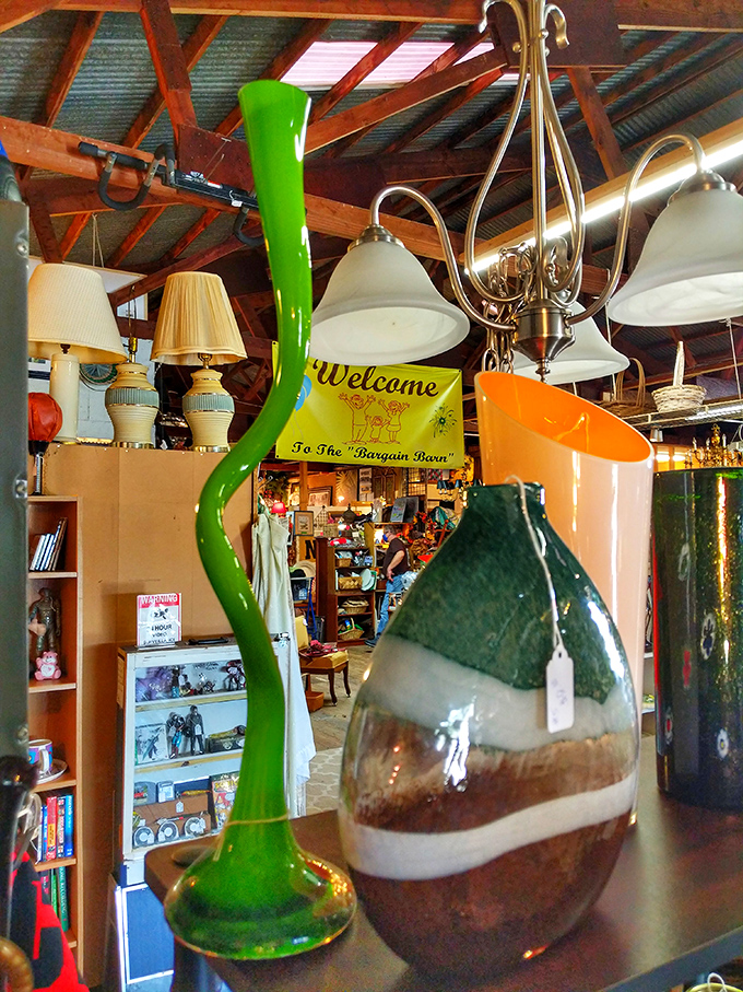 Quirky vases make a statement against the rustic backdrop. That lime green showstopper would make even the most modest daisies feel fancy.