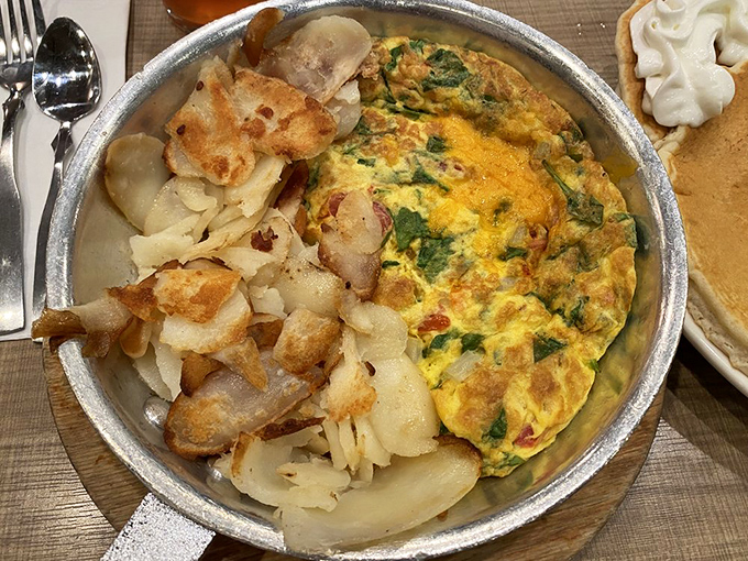 This isn't just an omelet &ndash; it's a skillet of morning joy with perfectly crisped potatoes that would make any grandmother nod in approval.