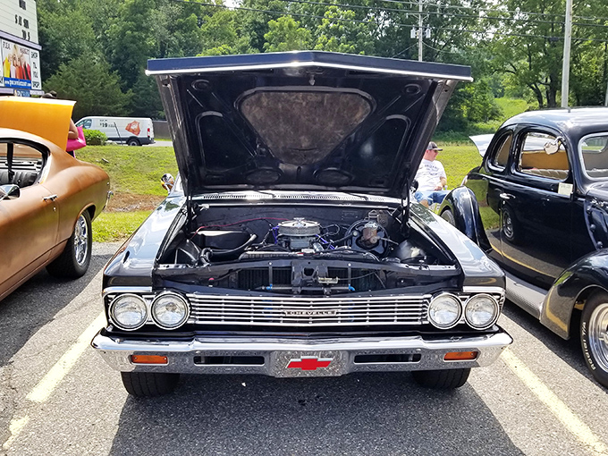 Classic American muscle on display – this vintage Chevrolet represents an era when cars weren't just transportation, but works of art.