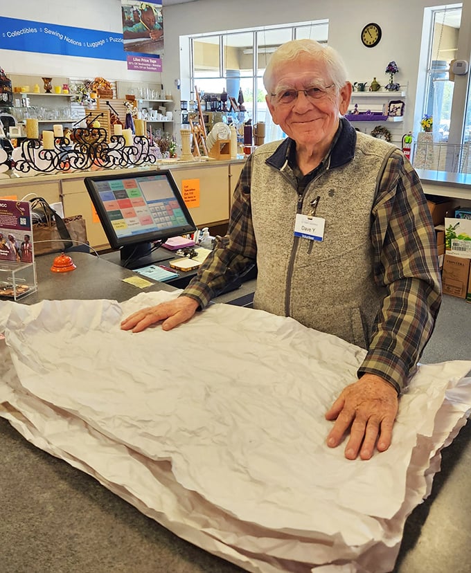 Volunteers are the heartbeat of Care & Share, wrapping purchases with the same care they'd use for family heirlooms.