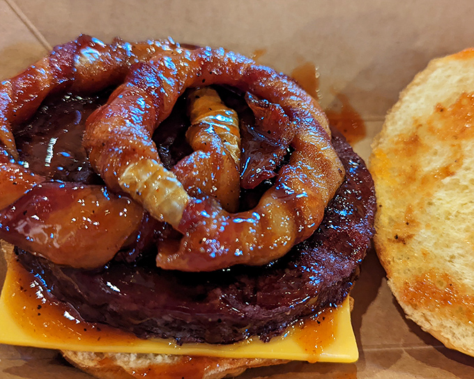 This isn't just a burger&mdash;it's a meaty masterpiece topped with sausage that makes ordinary cheeseburgers look like they're not even trying.