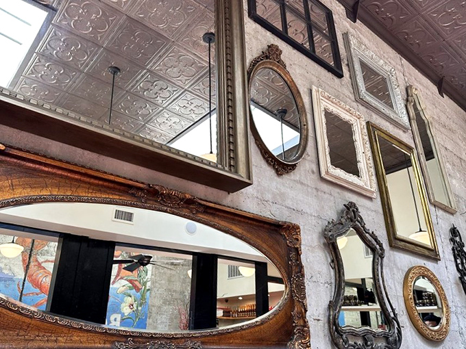 The eclectic collection of mirrors doesn't just decorate &ndash; it expands the space while reflecting all those "oh my goodness" food reactions.
