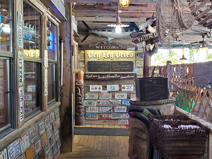 License plates and nautical knick-knacks create that perfect "we've-been-collecting-this-stuff-for-years" vibe that corporate designers can't replicate.