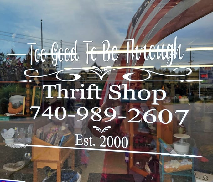Window signage that promises treasures within. Established in 2000, but the bargains are timeless.