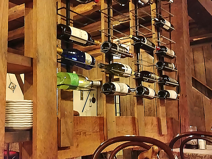 Wine storage that doubles as functional art&mdash;bottles waiting patiently for their moment to shine alongside a perfectly cooked steak.
