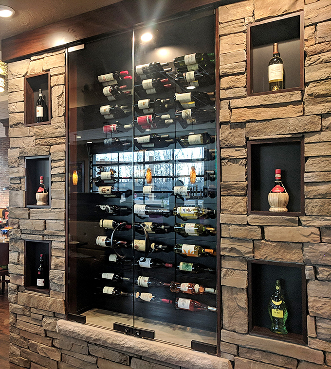 A wine display that makes you want to cancel your afternoon plans and work your way through the collection, one bottle at a time.