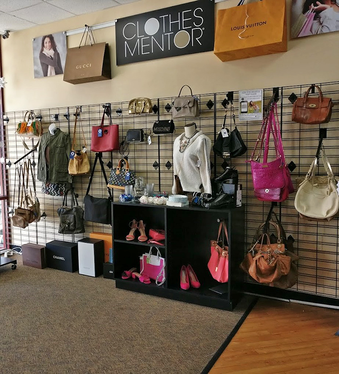 Designer shopping bags hanging as décor—a cheeky reminder that yes, these treasures once commanded full retail prices elsewhere.