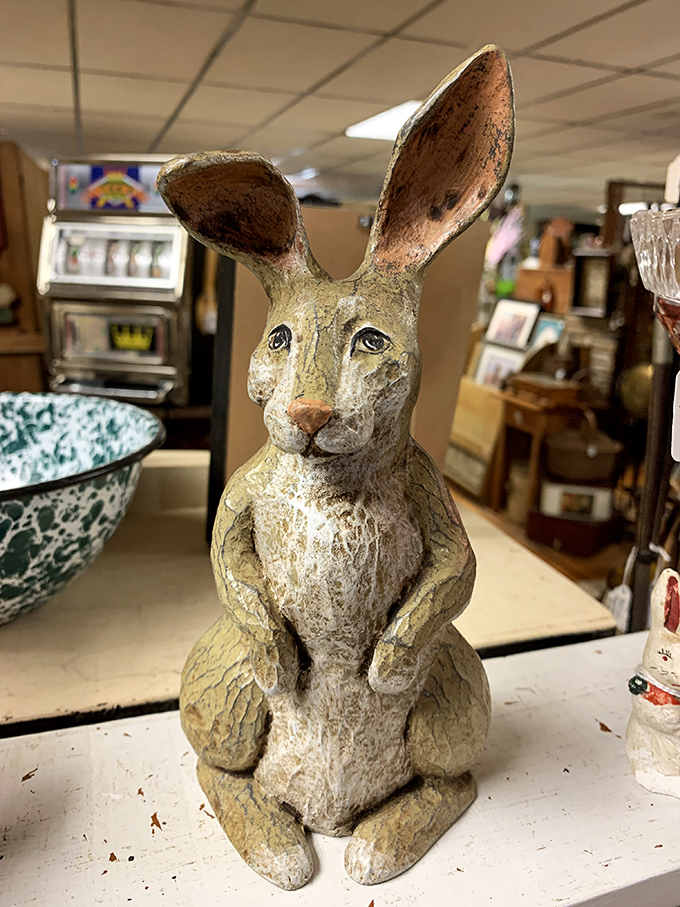 Hop to it! This weathered rabbit sculpture has seen more springs than most of us, yet still maintains that "I know something you don't" expression.