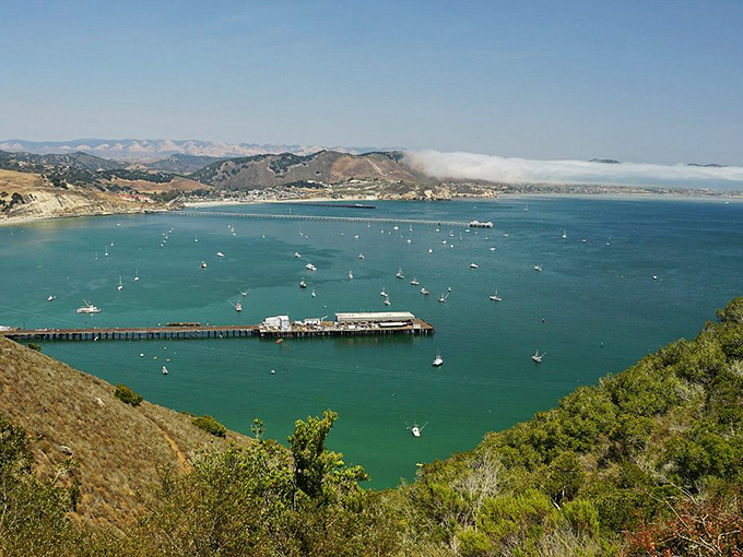 From above, Avila's protected bay reveals its secret: a perfect horseshoe of calm waters surrounded by hills that block the wind and worries.