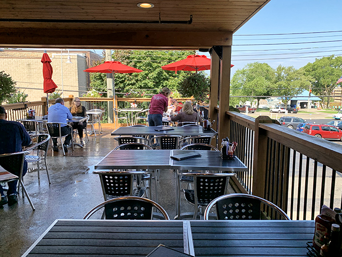 Upstairs seating offers intimate spaces perfect for savoring every bite of culinary perfection below.