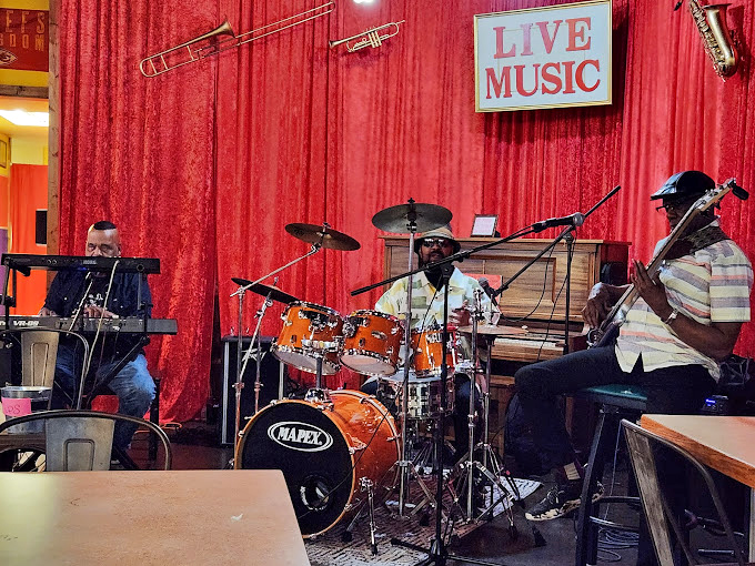 Live music that feeds your soul while the kitchen feeds your body. These musicians aren't just playing&mdash;they're seasoning the atmosphere.