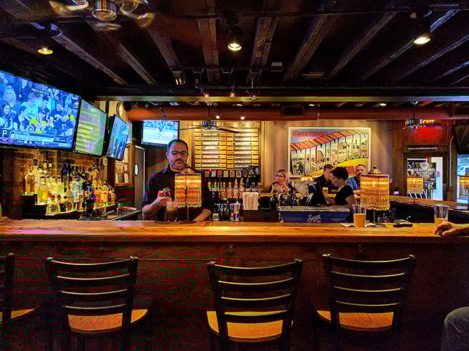The bar area&mdash;where strangers become friends and friends become regulars. Notice the Wilmington pride displayed alongside an impressive spirits collection.