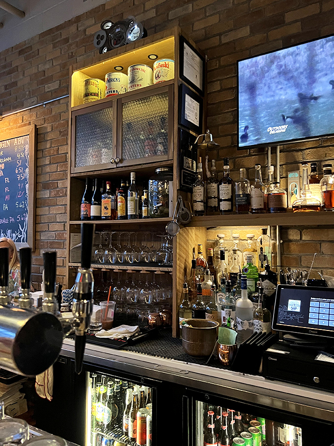 A bar stocked so beautifully it makes you wonder if "bartender" is just another word for "liquid artist with excellent taste."