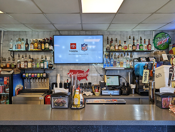 Not just a bar, but a community gathering spot where strangers become friends over shared love of sandwiches and cold beverages.