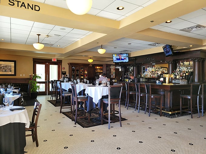 The bar area whispers "come, have a drink" with the confidence of someone who knows they mix a mean Manhattan and keep good company.