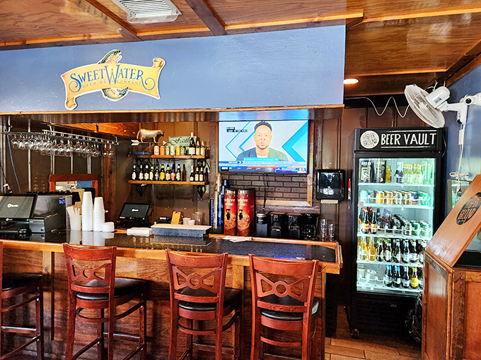 The bar area isn't an afterthought &ndash; it's a destination. Local craft beers, Sweetwater on tap, and a TV perfectly positioned for casual viewing.