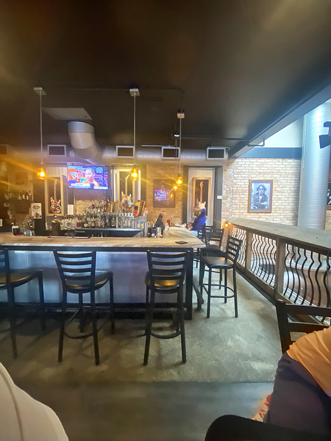 The bar area&mdash;where strangers become friends and friends become burger evangelists under the warm glow of pendant lights.