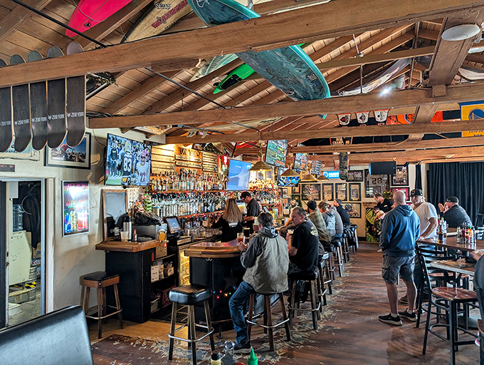Where locals gather to debate surf conditions, share stories, and collectively appreciate that they're not stuck in some sterile sports bar in the suburbs.