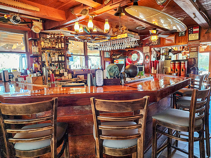 A bar that's seen its share of fishing tales, first dates, and celebrations. Wood polished by countless elbows and stories.