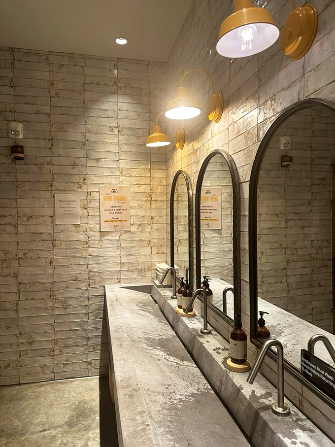 Even the restroom maintains the industrial-meets-rustic aesthetic. No detail overlooked in this temple of smoked meat devotion.