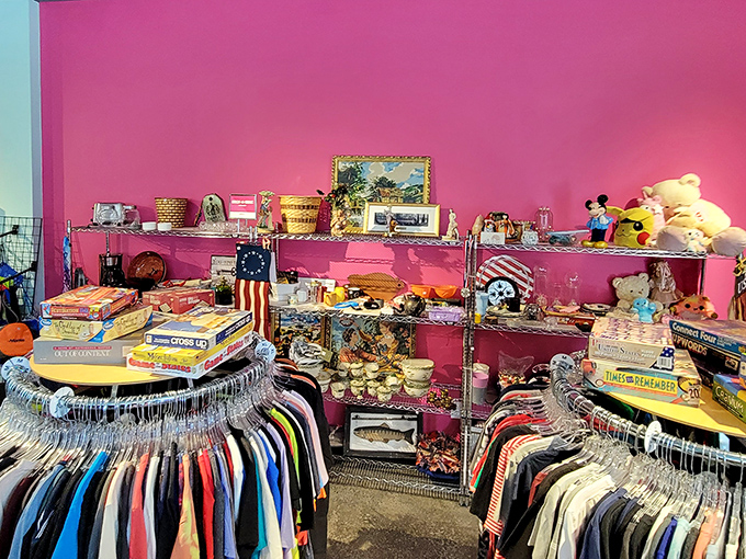 A pink-walled wonderland of childhood nostalgia, where board games, stuffed animals, and books await new homes and fresh adventures.