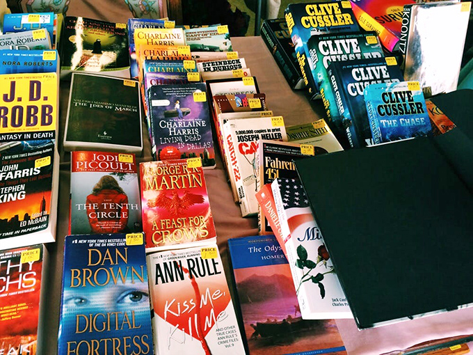 Literary treasures from King to Cussler line up like old friends at a reunion, their spines slightly worn from adventures shared with previous readers.