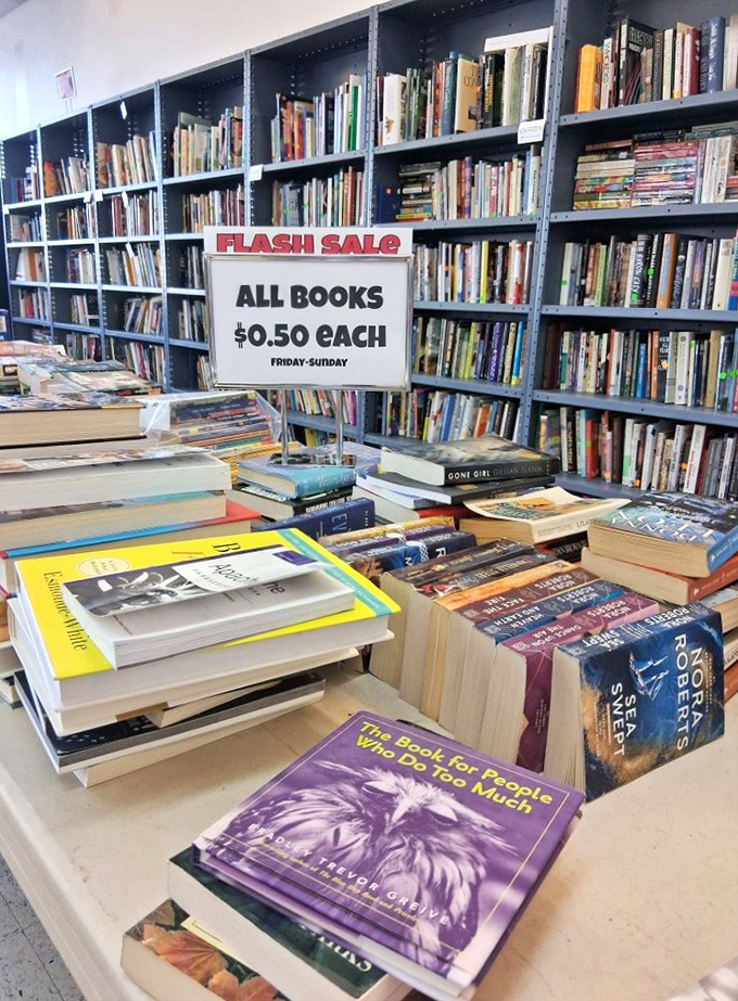 Book lovers' paradise where fifty cents buys you someone else's literary journey. That Einstein book seems particularly fitting for thrift wisdom.