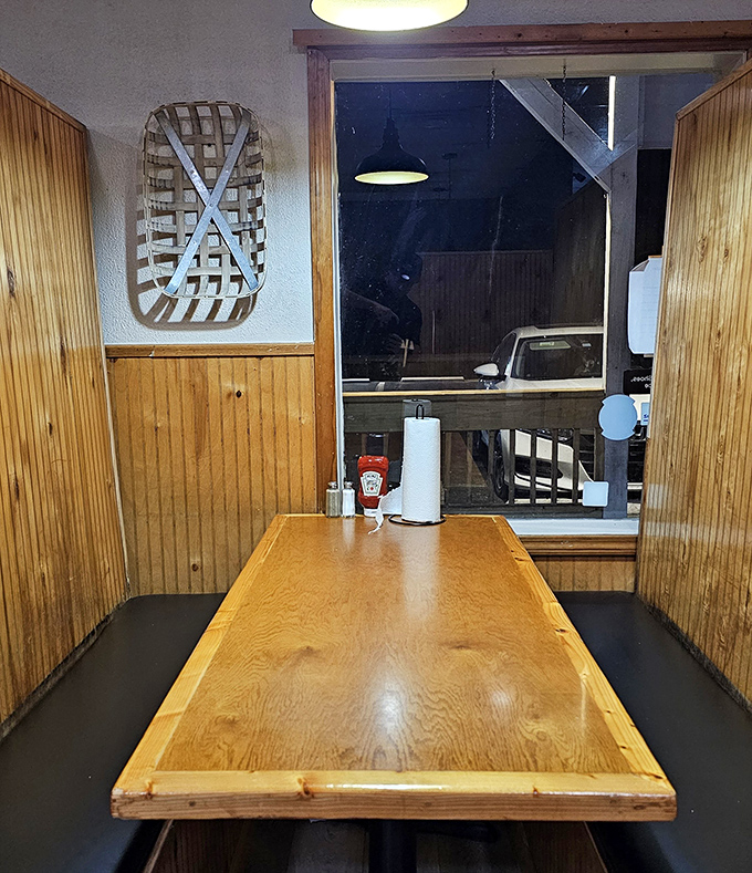 Wooden booths that have likely witnessed countless first dates, family celebrations, and "I shouldn't have another bite but watch me" moments.