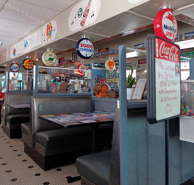 Booths designed for lingering conversations and newspaper-reading regulars. The perfect vantage point for people-watching with coffee refills.
