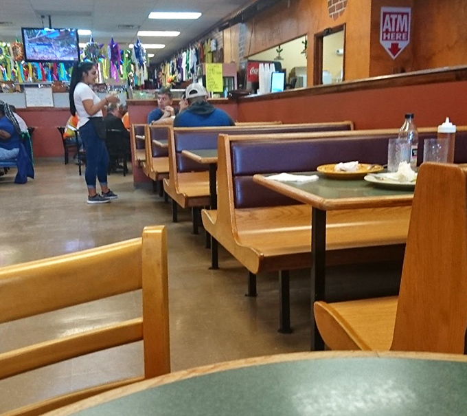 Comfortable booth seating invites you to linger over your meal. The simple, functional dining area puts the focus where it belongs &ndash; on the extraordinary food.