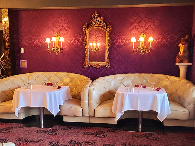These intimate booths have witnessed countless anniversaries, proposals, and celebrations&mdash;all against a backdrop of rich burgundy and gold.