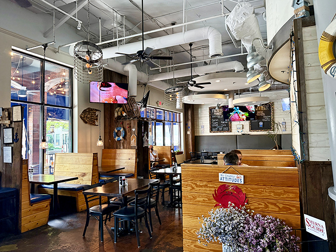 Cozy wooden booths create intimate islands in a sea of delicious possibilities. The perfect setting for your next seafood adventure.