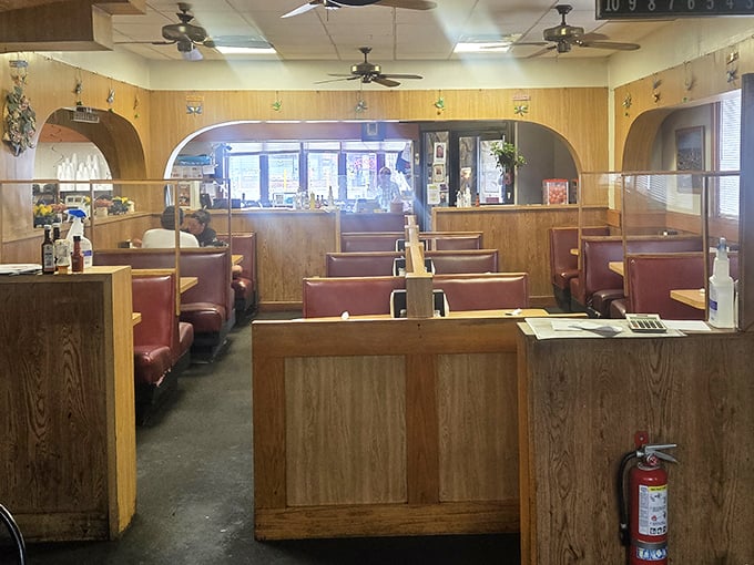 Booths divided by wooden partitions&mdash;creating little islands of privacy in a sea of comfort food and conversation.