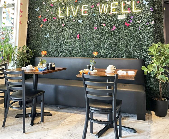 The "Live Well" wall isn't just Instagram bait—it's a genuine philosophy served alongside every plate that leaves the kitchen.