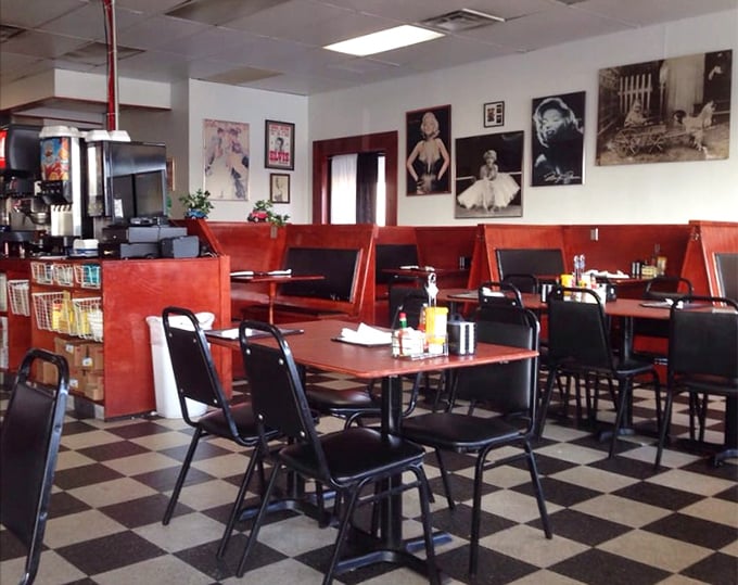 Red vinyl booths that have hosted more life stories than a therapist's office.