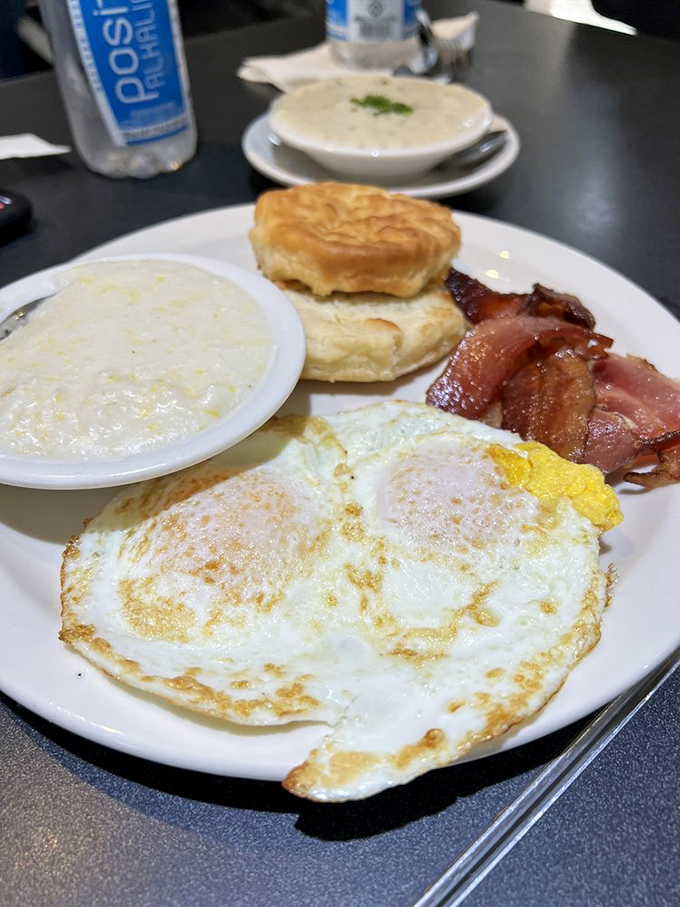 The classic Southern breakfast plate&mdash;where eggs, bacon, grits, and biscuits gather for their daily morning meeting of deliciousness.