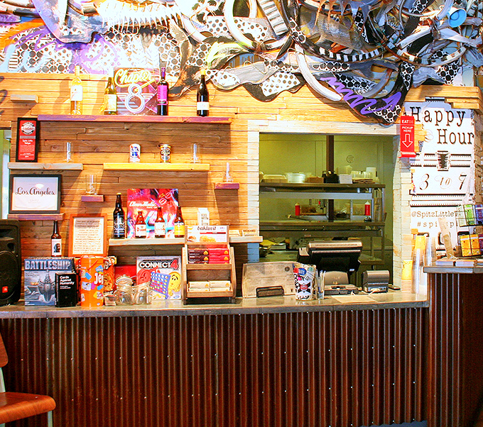 Games, drinks, and good vibes&mdash;this counter area proves Spitz knows food is just one part of a memorable dining experience.
