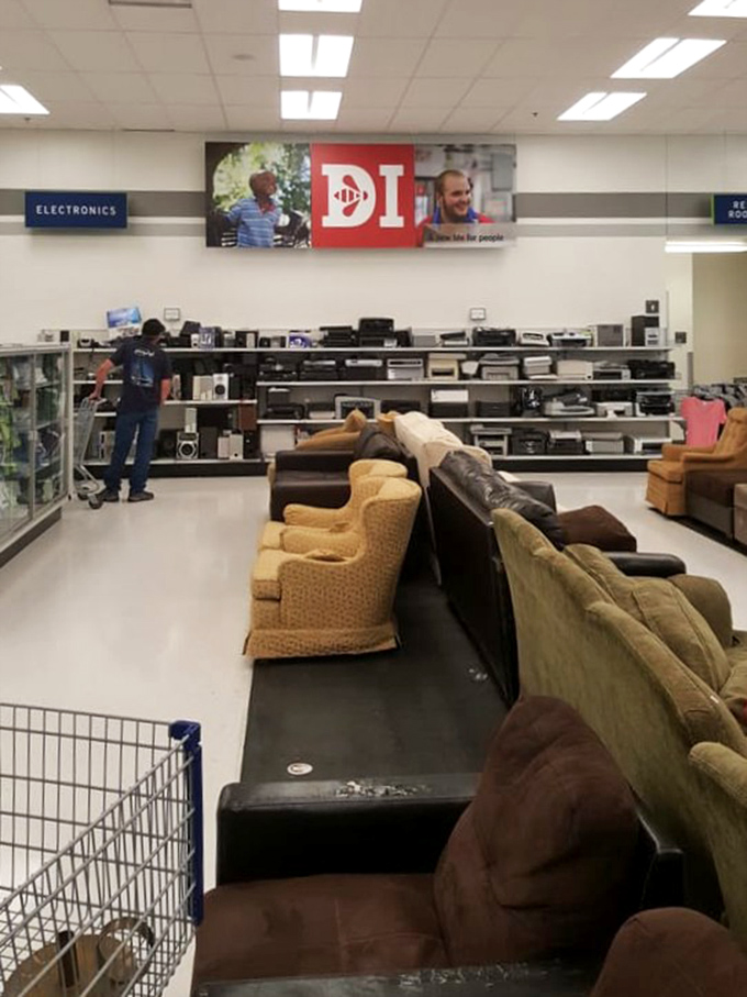 Comfortable seating awaits new living rooms - recliners and sofas ready to become someone's favorite relaxation spot.