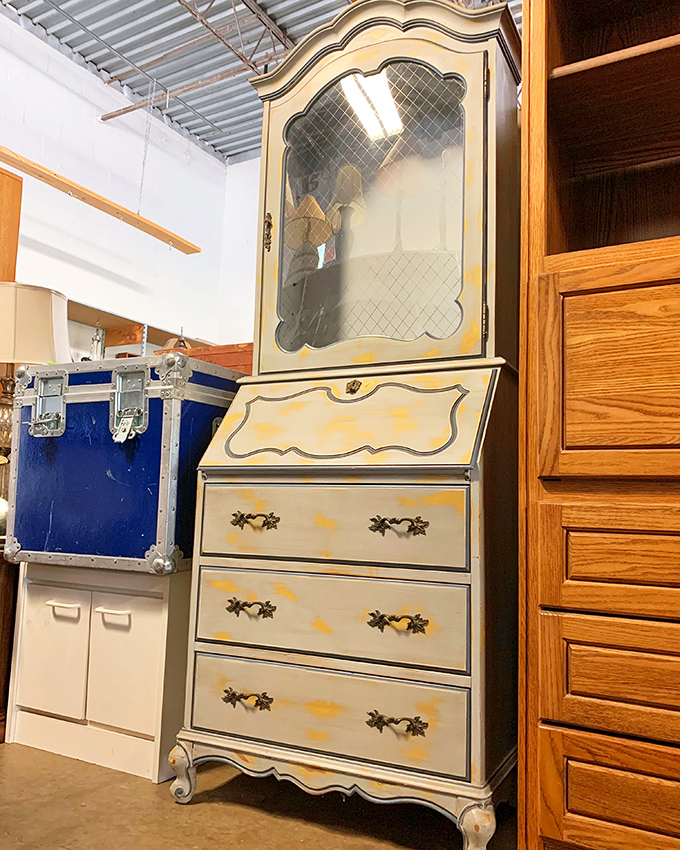 This French Provincial secretary desk silently judges your IKEA furniture while offering elegant storage at a non-aristocratic price.