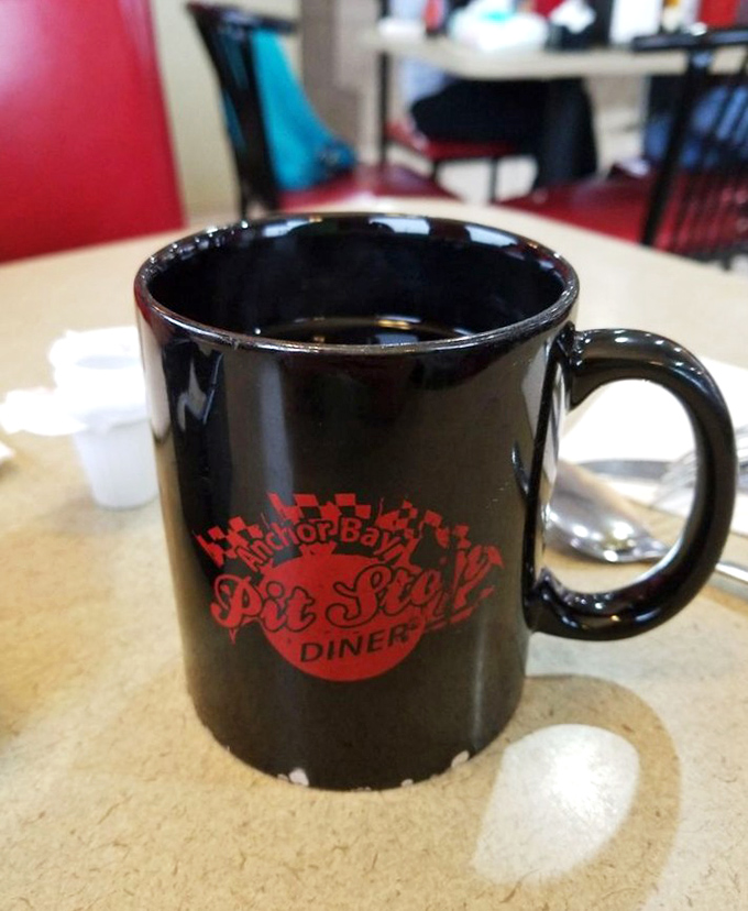 The unofficial mascot of every great diner—a sturdy mug of coffee that promises to be there for you, refill after glorious refill.