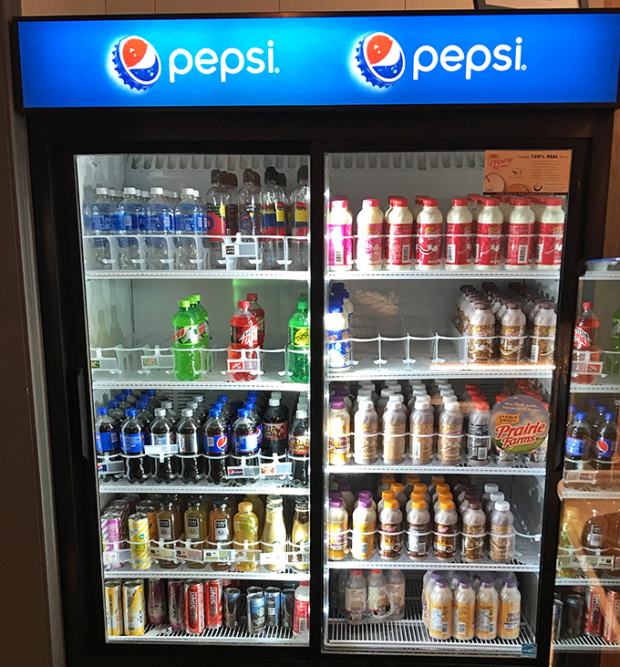Even the beverage case understands its place in the hierarchy&mdash;you're here for the donuts, but hydration is still important.